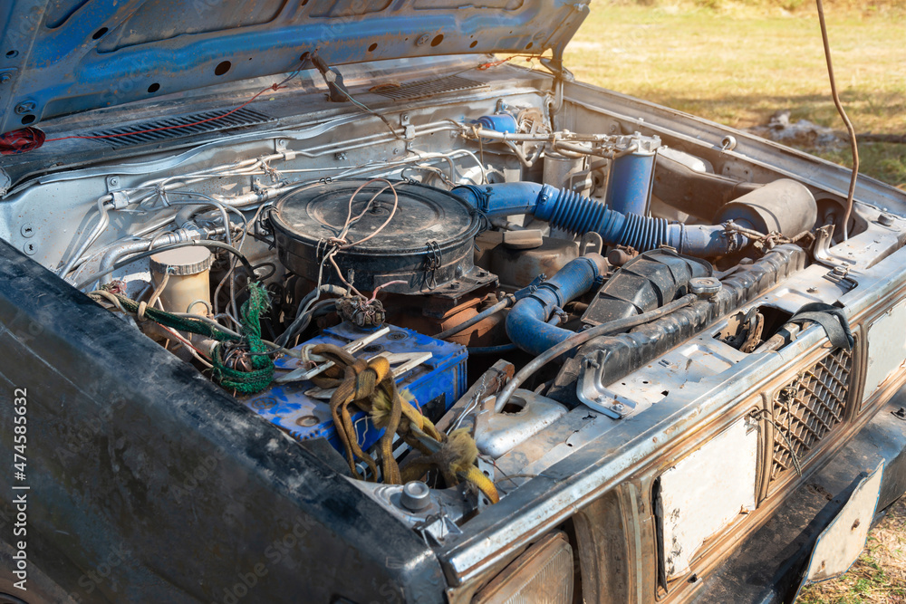 Old used diesel engine with rusty and dirty auto parts, water ...