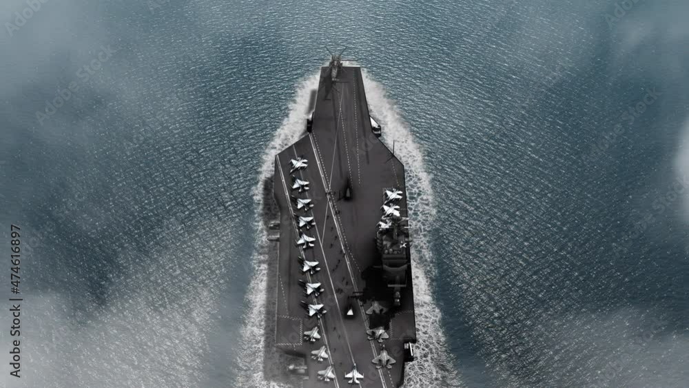 Aircraft carrier crossing the ocean Aerial view High altitude view of ...