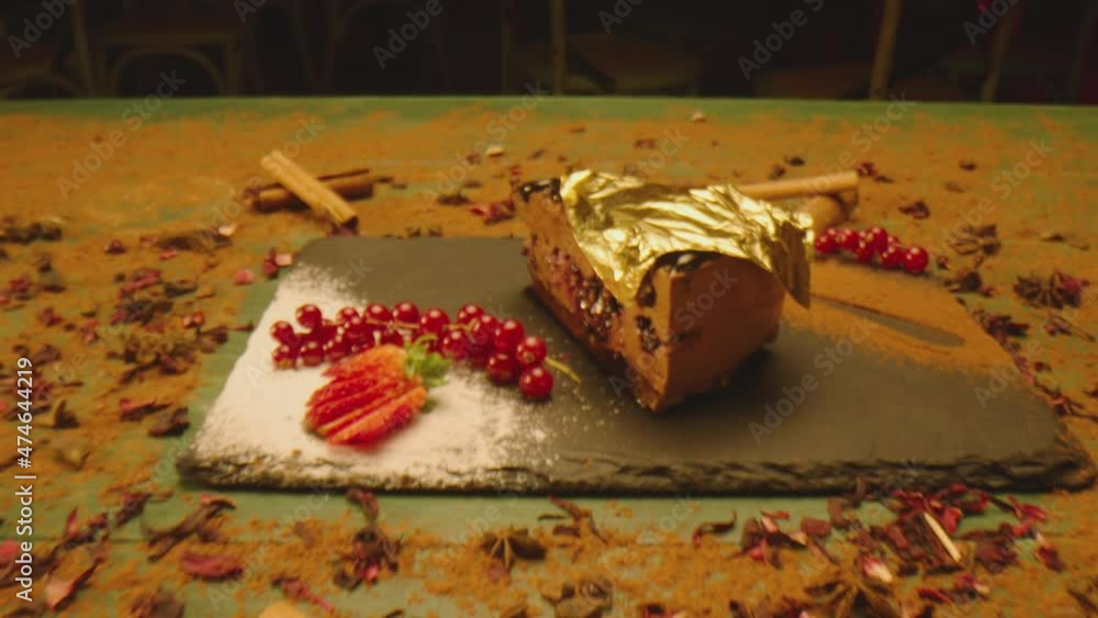 Chief cooker put 24 karat gold flake on brownie cake . Beautiful ...