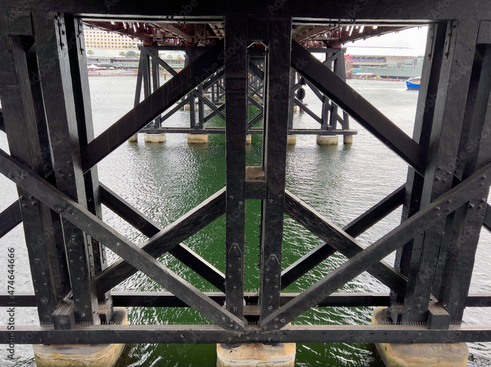 Underneath metal structure of Pyrmont Bridge, Sydney, New South Wales ...