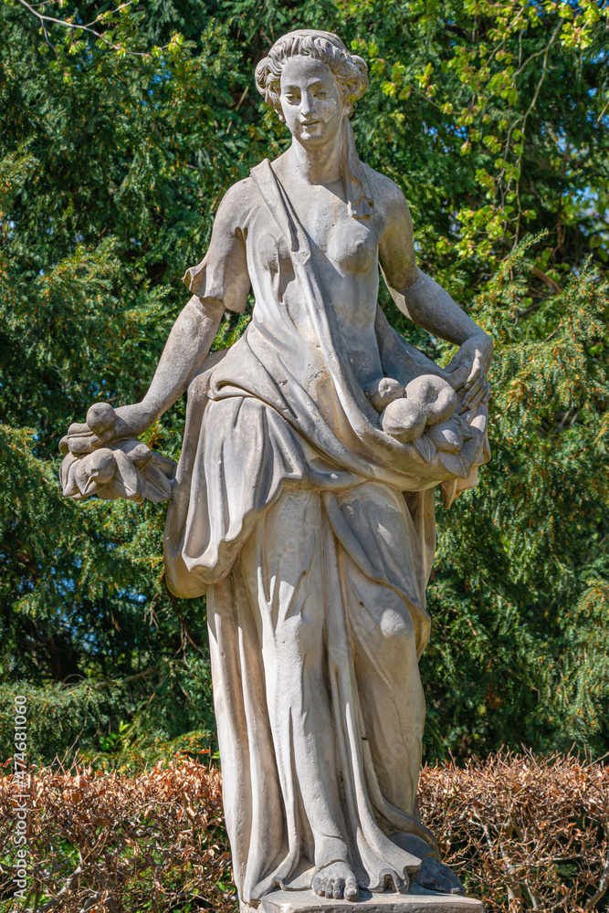 Ancient decayed statue of a sensual Renaissance Era woman in the ...