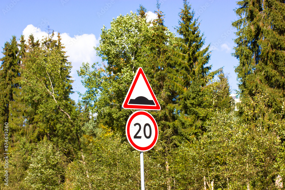 two-road-signs-for-motorists-warning-about-pedestrians-and-cyclists