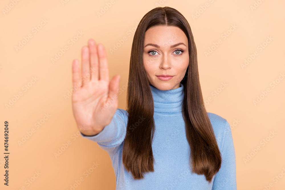 Portrait of calm focused pretty girl hand palm show rejection symbol ...