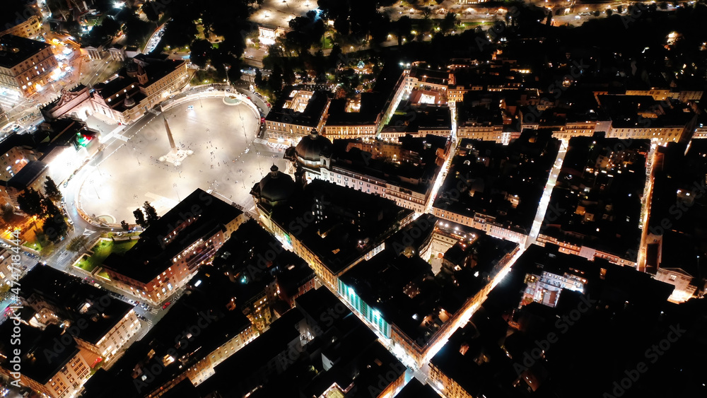 Aerial drone night shot from iconic illuminated Piazza del Popolo or People's square, an ...