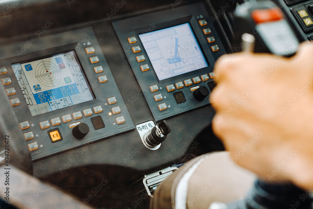 The control panel of the crane in the driver's cabin of the automobile ...