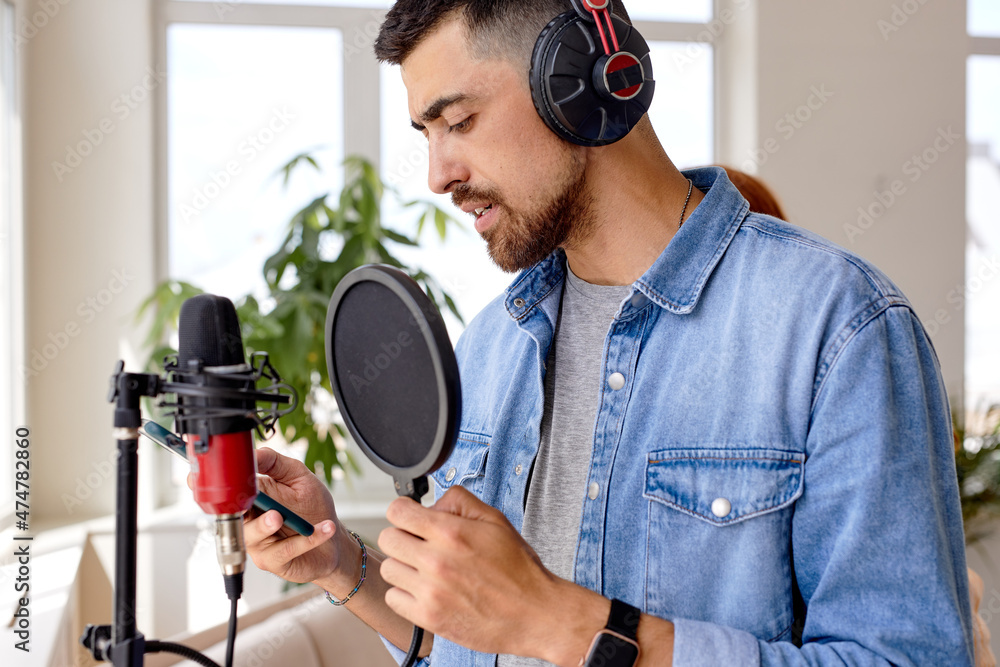 music, show business, people and voice concept.handsome male singer ...