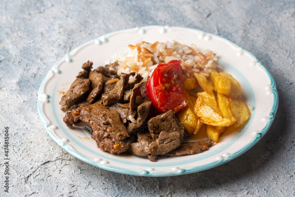 Liver pan (Albanian liver) Turkish traditional food. Liver over rice ...