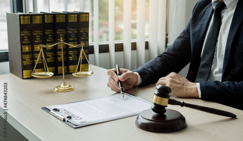 Professional man lawyers work at a law office There are scales, Scales ...