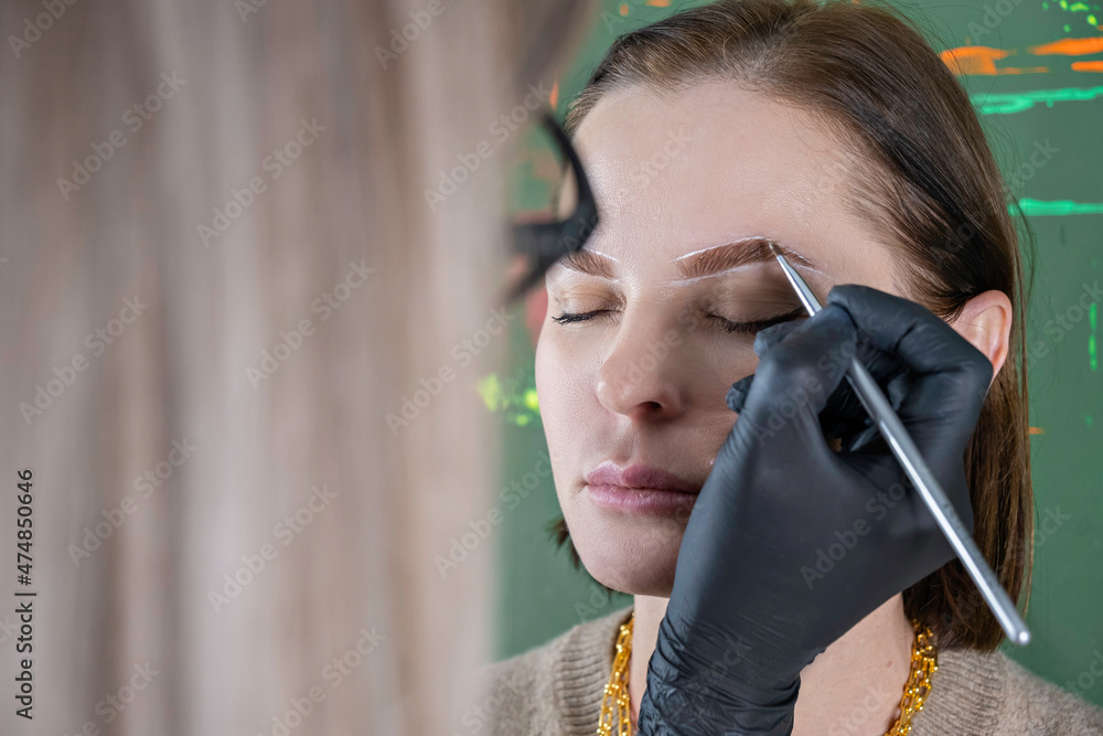 eyebrow painting with brush correction, coloring and lamination ...