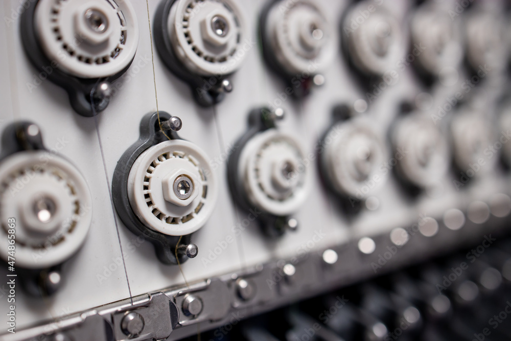 The tension control unit of the thread of an industrial embroidery ...