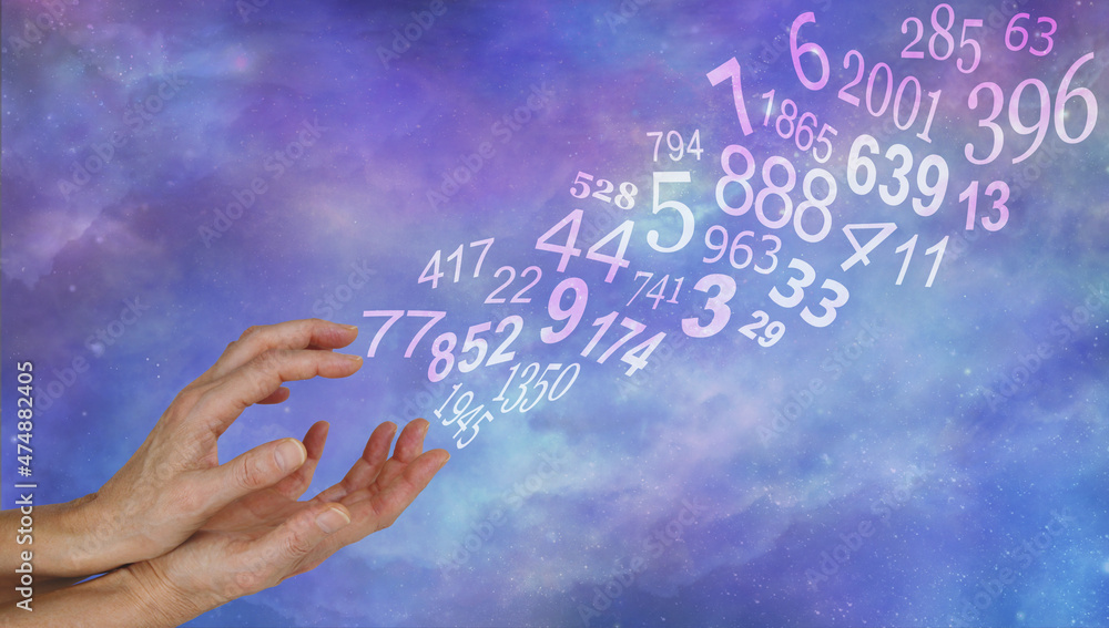 Numerology can provide guidance - cupped hands with a flow of random ...