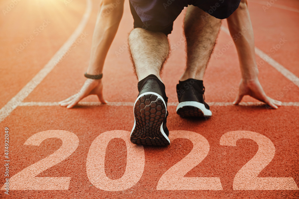 Start of people running on the running court, with sunlight.Beginning ...