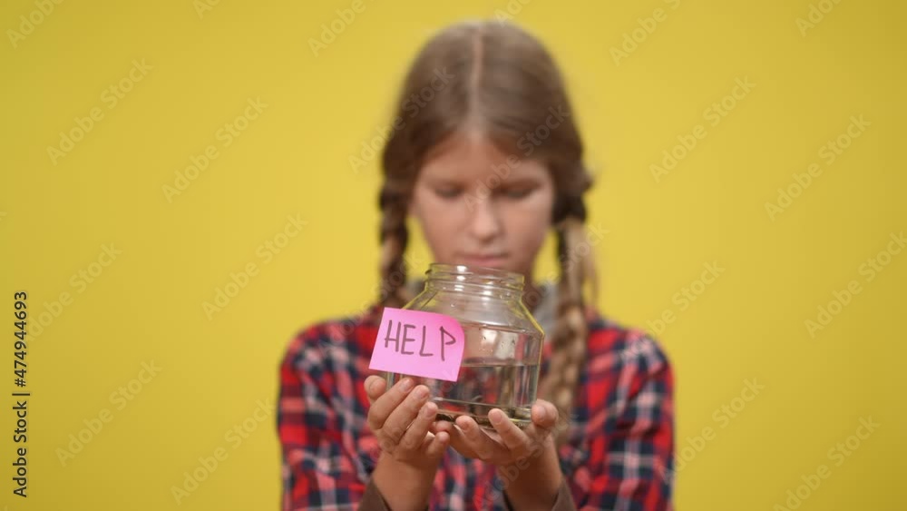 Help on aquarium bottle with little fish in hands of blurred teenage ...