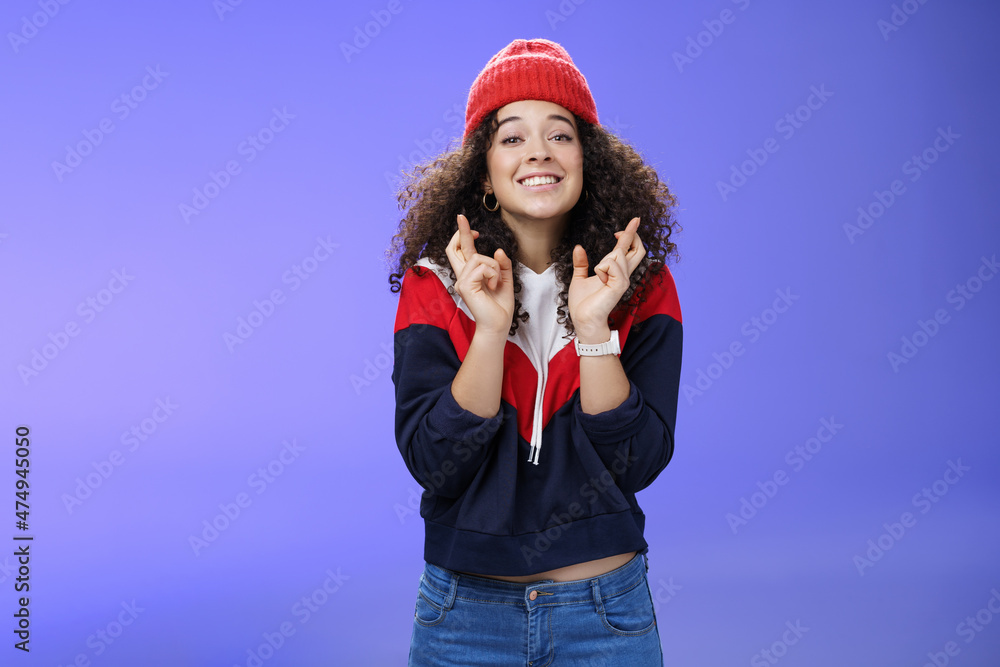 Dreamy optimistic woman praying friend will win standing supportive and ...