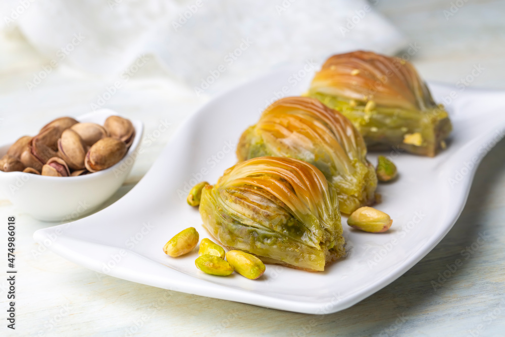 Turkish Midye Baklava ( Mussel Shape Baklava ) with green pistachio ...