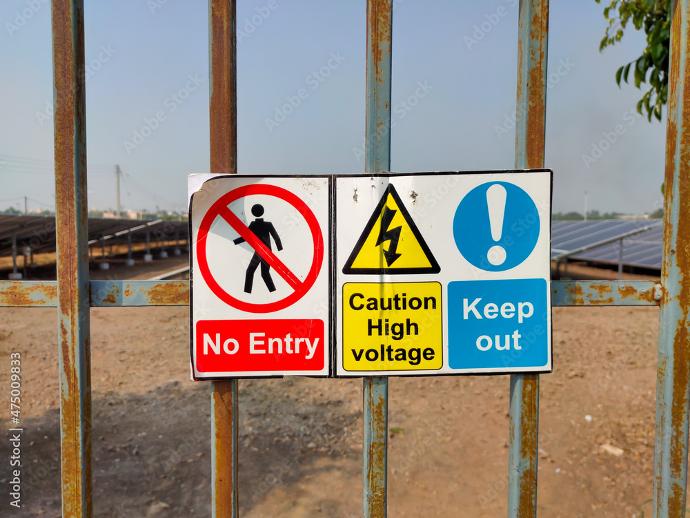 no entry and danger high voltage sign board with symbol. Stock Photo ...