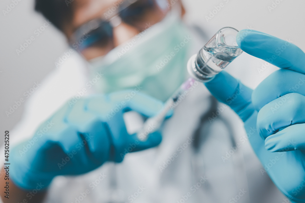A doctor or scientist in the COVID-19 medical vaccine research and ...