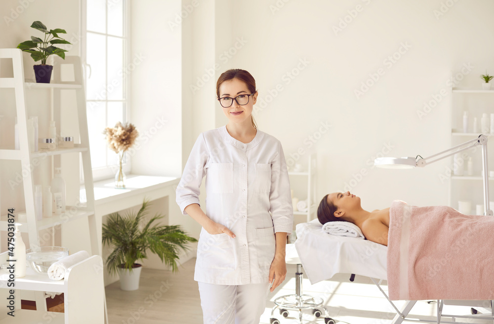 Female dermatologist, skin therapist, beautician and skincare ...