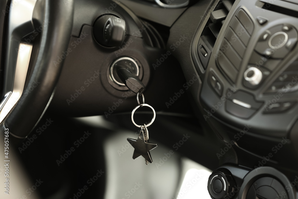 Key from modern car in ignition lock Stock Photo | Adobe Stock
