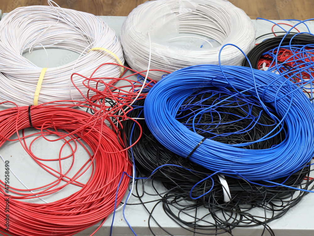 Coils of electric colored wires for the installation of an electric ...