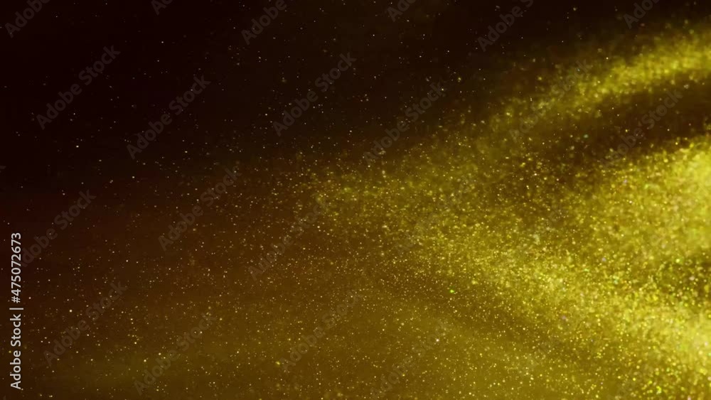 Glitter fluid motion. Molten gold in to liquid. Sparkling yellow liquid ...