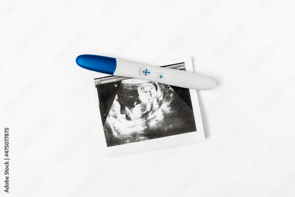 Positive pregnancy test on ultrasound photo. A positive pregnancy test ...