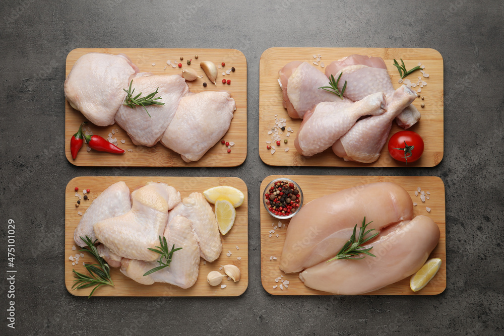 Flat lay composition with fresh raw chicken meat on grey table Stock ...