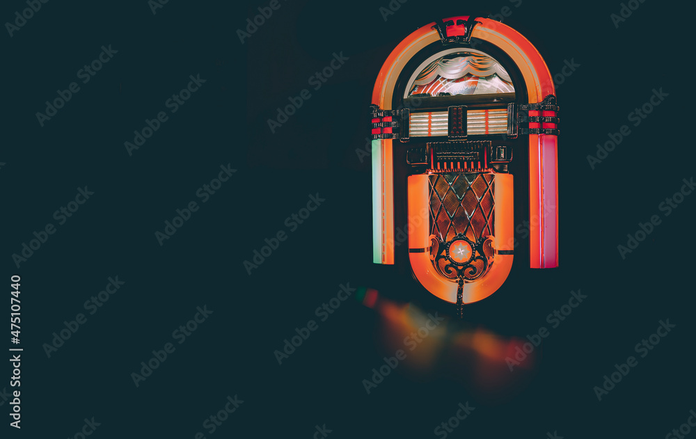 Retro jukebox on black background Stock Photo | Adobe Stock