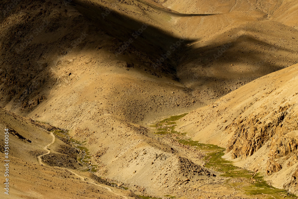 Aerial view of ladakh landscape, play of light and shadow on Himalayan ...