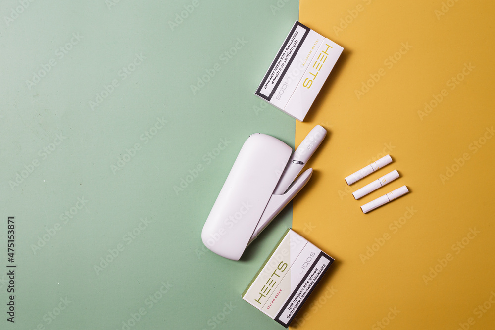 Heating device for tobacco White IQOS 3 duo Stock Photo | Adobe Stock