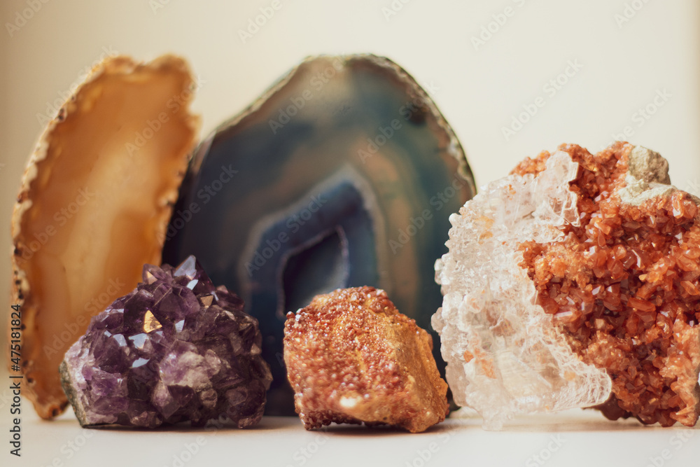 Large blue crystal of agate and druse crystals, cross section isolated ...