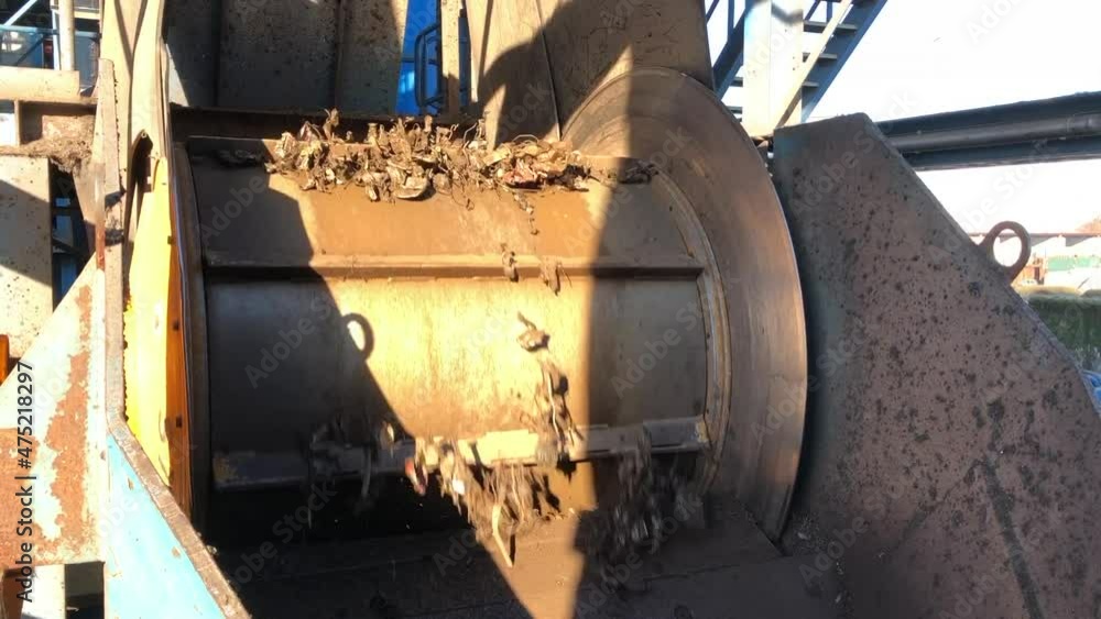 A spinning magnet from a shredder which sorts recycled metal. Dividing ...