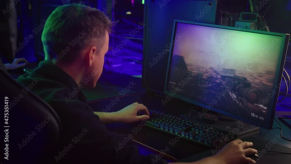 Gamer Focused On Challenging Online Team Battle In Modern First-Person ...