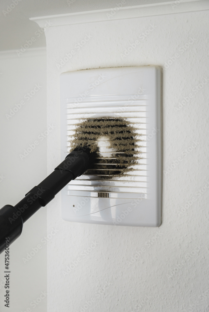 Very dirty and dusty white plastic ventilation grill. Ventilation shaft ...