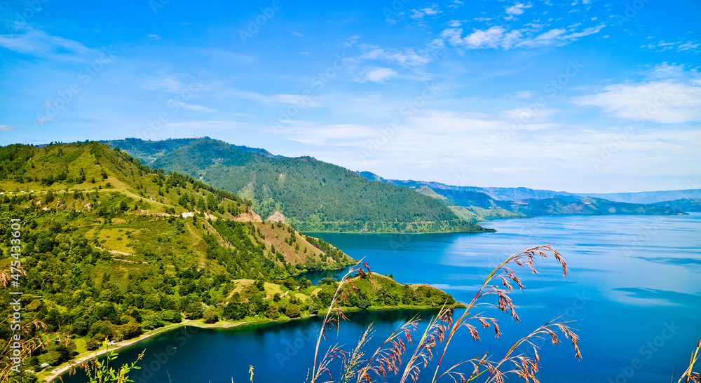 The beauty of Lake Toba which is a caldera lake comes from an ancient ...