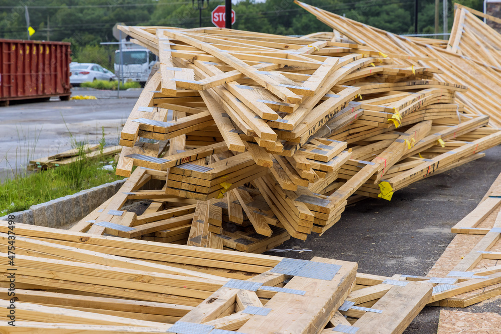 Stacker wooden material boards and beams for new house on of under ...