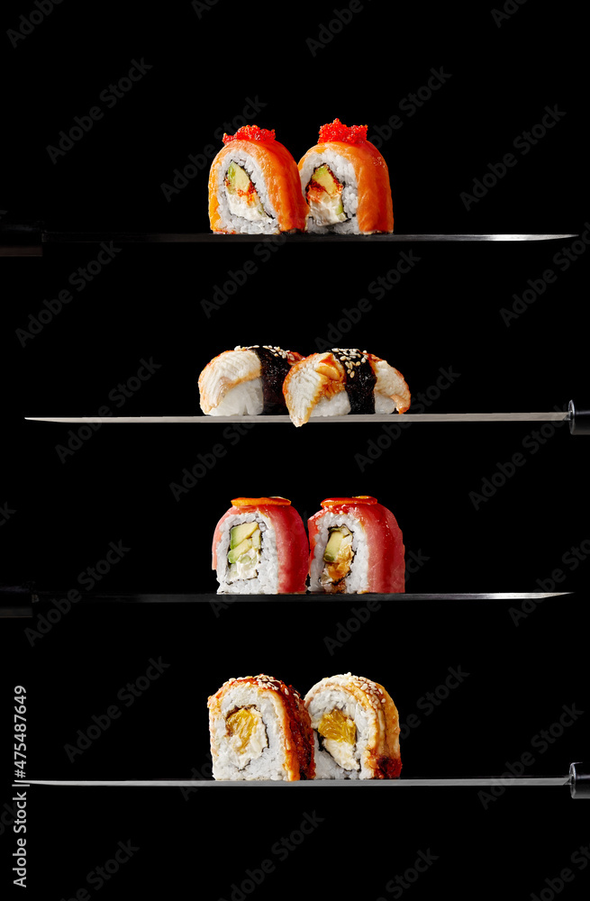 Philadelphia rolls with salmon, unagi rolls, uramaki with tuna and ...