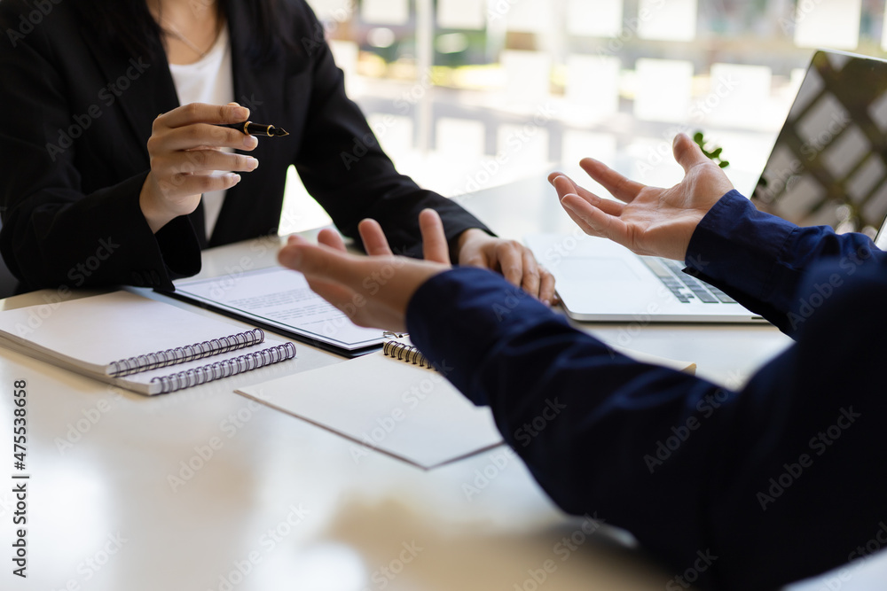 New employee explaining and gesturing during job interview. Stock Photo ...
