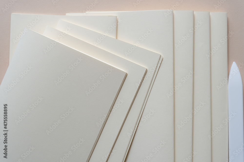 bookbinding - signatures with bone folder Stock Photo | Adobe Stock