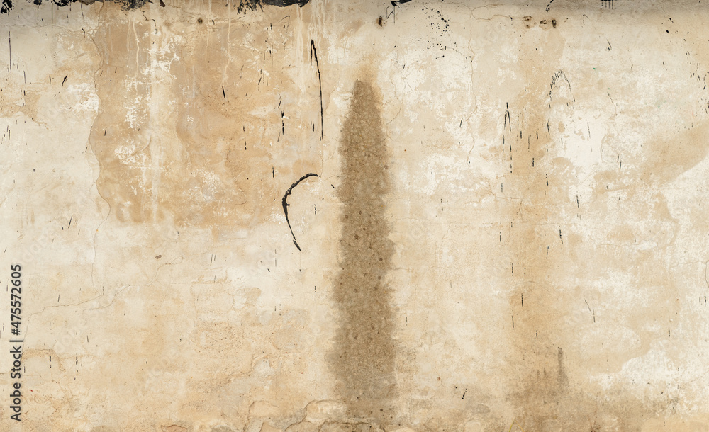 Texture of grey concrete wall with dark water and oil marks running ...