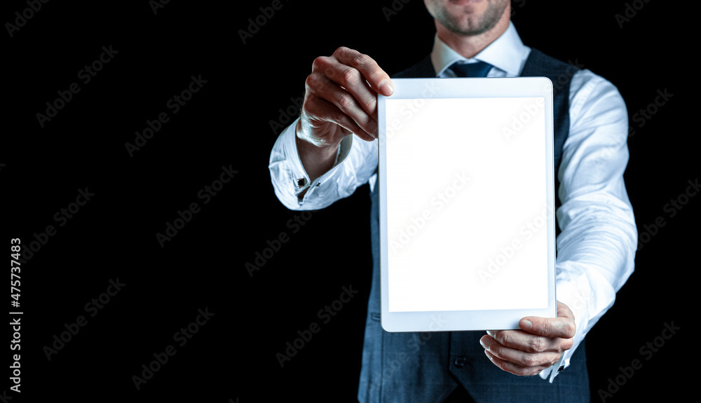 Device mockups. Businessman holding mobile tablet blank screen. Smart ...