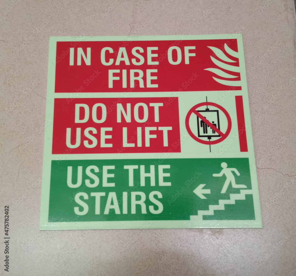 Information of safety worning banner, in case of fire do not use lift ...