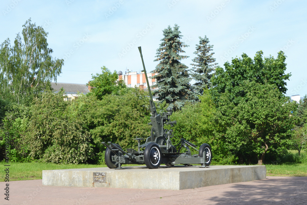Artillery gun in the square near the monument to fallen soldiers in ...