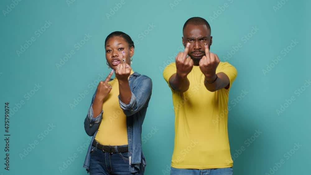 Vídeo do Stock: African american couple showing rude middle finger in ...