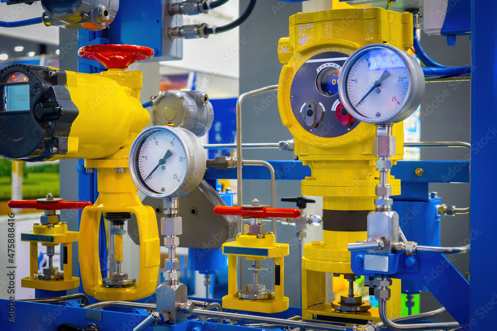 Gas pipes with pressure sensors. Pressure sweepers and valves on yellow ...