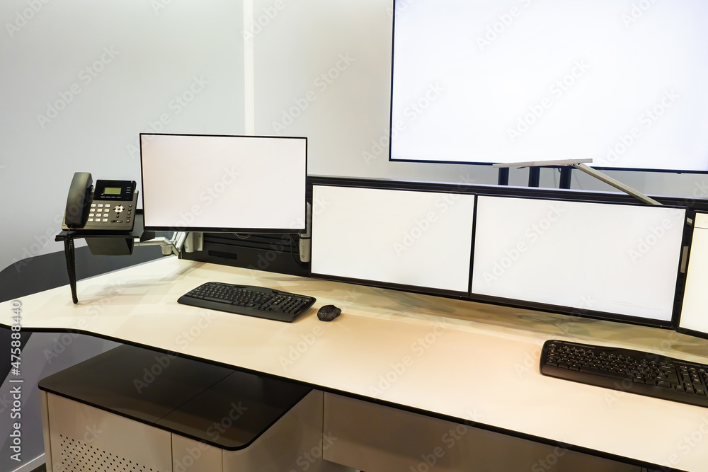 Mockup of monitors in control room. Many monitors with blank display ...