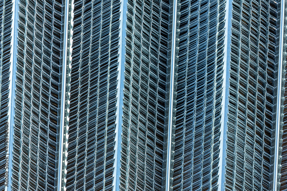 Up close metal mesh sheet blue silver coloring and angles Stock Photo ...