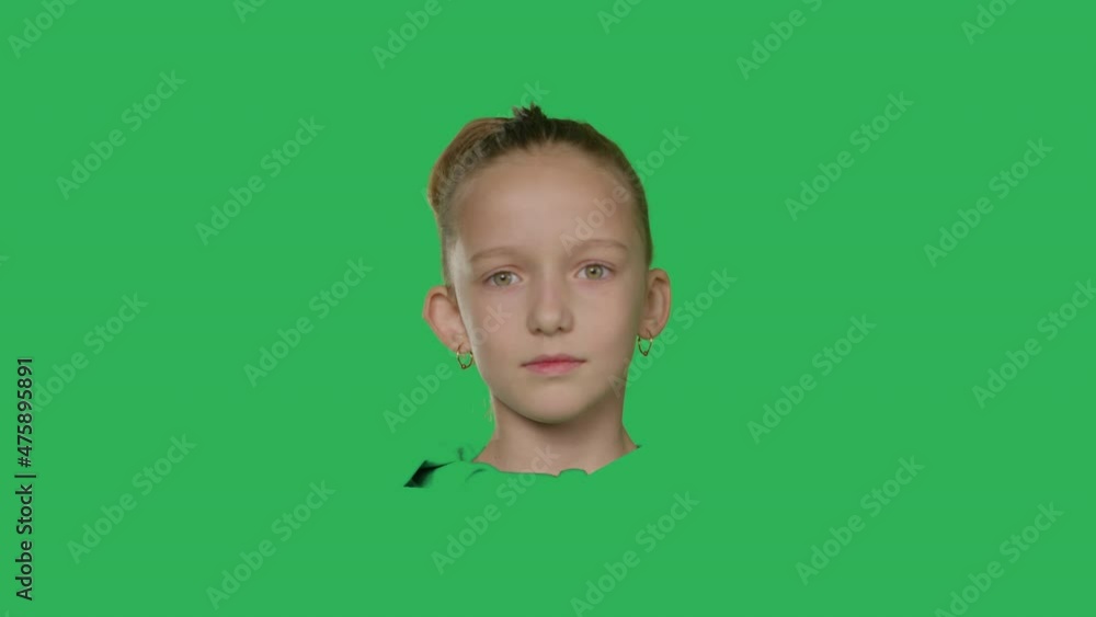 Close-up of head of girl rotate on green screen background, Fun. Chroma ...
