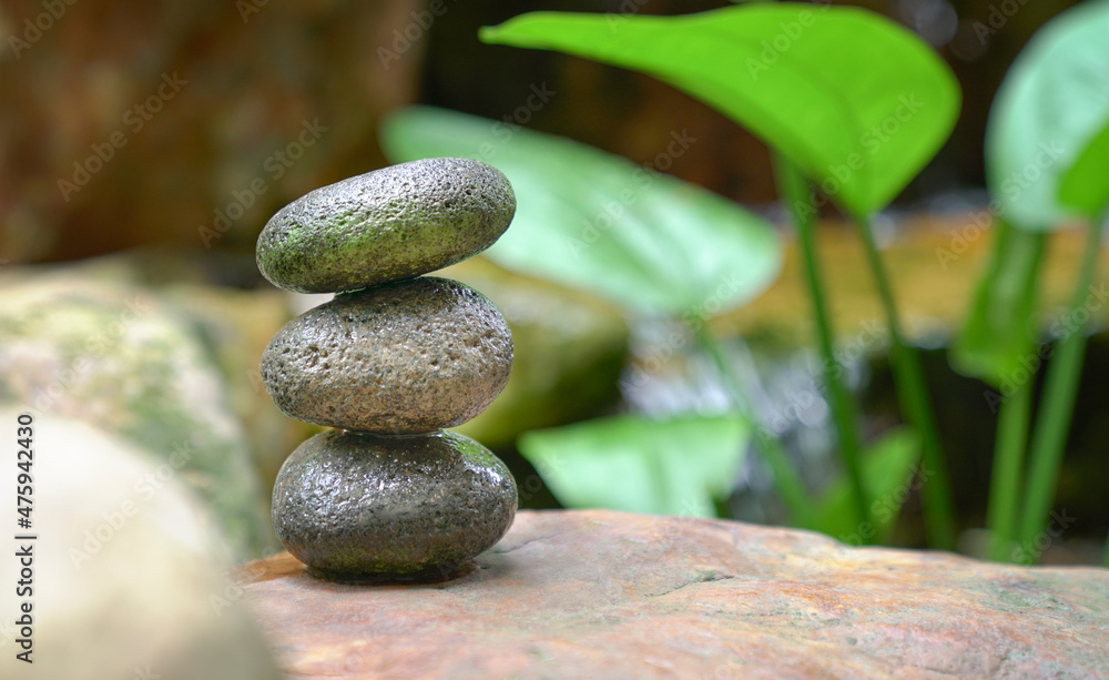 Stones stacked on top of each other. Balance, zen and stability concept ...