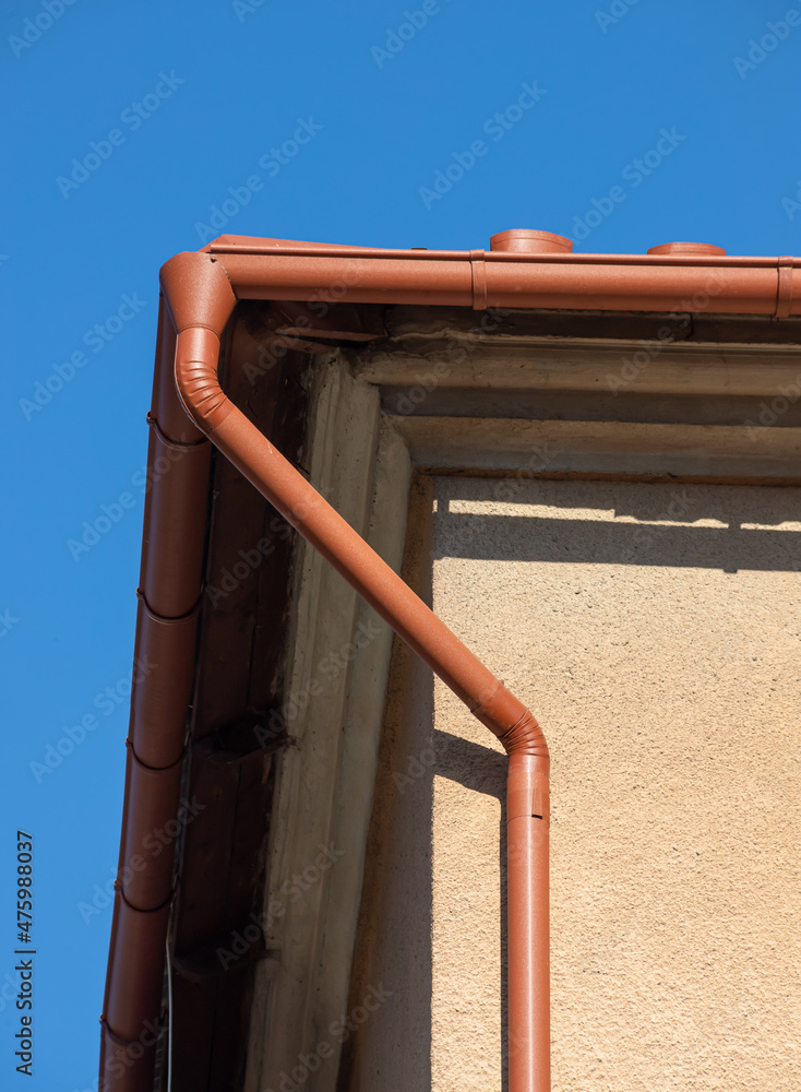 Building Modern House Construction with metal roof corner, rain gutter ...